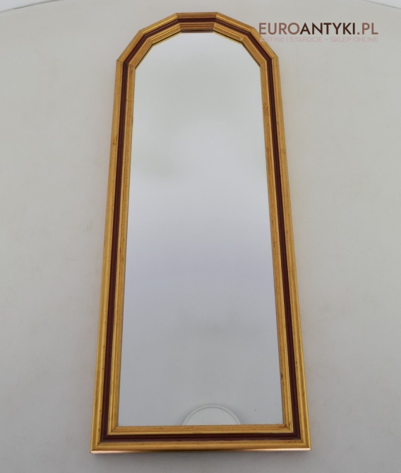 Smukłe lustro w stylu retro vintage. Stylowe lustra w zlotej ramie ...